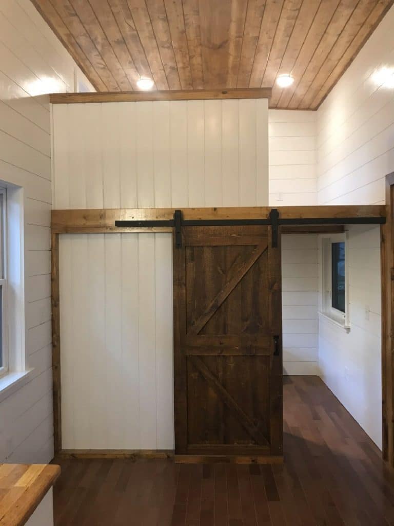 This Cute Little Log House Measures Just 9’ x 28’ and Has Three ...