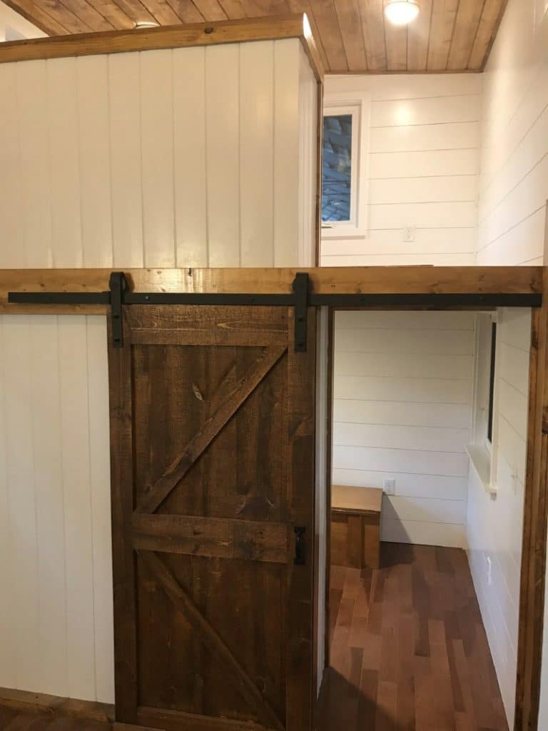 This Cute Little Log House Measures Just 9’ x 28’ and Has Three ...
