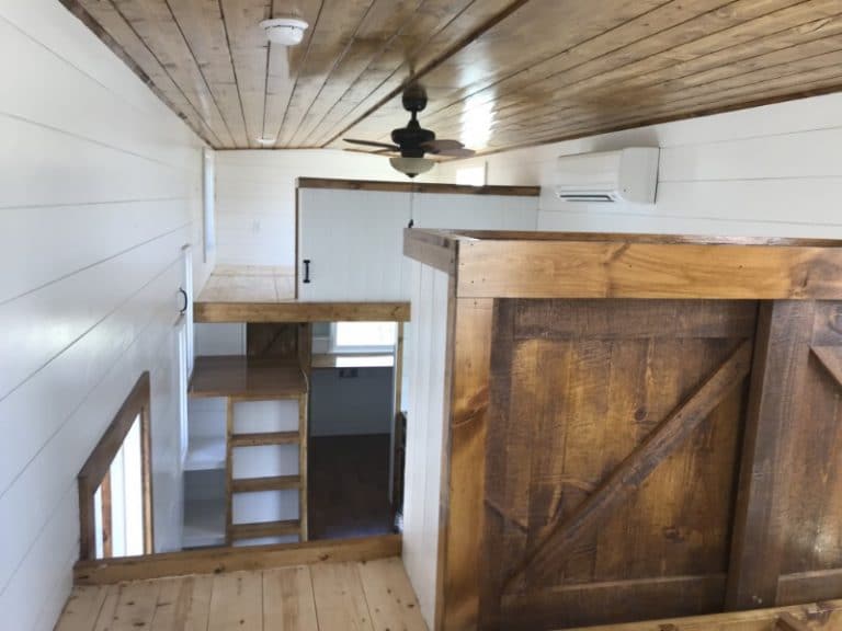 This Cute Little Log House Measures Just 9’ x 28’ and Has Three ...