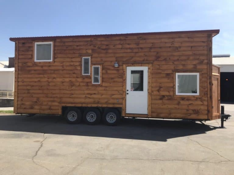 This Cute Little Log House Measures Just 9’ x 28’ and Has Three ...